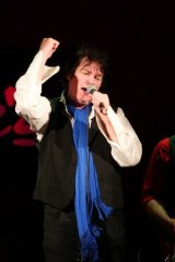 Doc Neeson makes his final journey in private ceremony