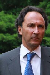 Adler son accused of breaching contract