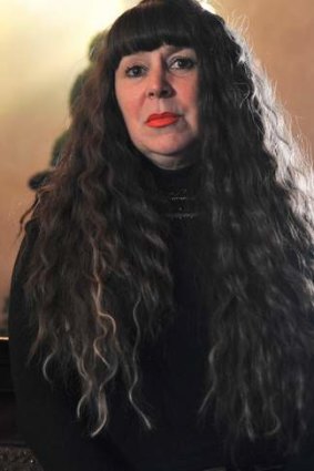 Liquidator claims in writ that stripper photos led to dismissal