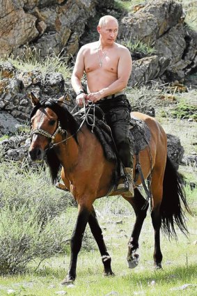 Stripped for action, Putin puts pecs in play