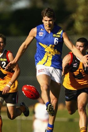 Roos cast eye over son of premiership hero