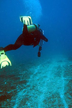 Three kilometres of Great Barrier Reef damage, 20 years to mend