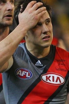 Angus Monfries urged to split from Essendon-funded legal defence