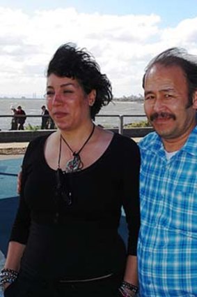 Husband charged as body found under backyard slab