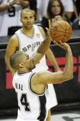Neal gets more bang for his bucks in Milwaukee