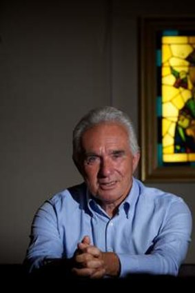 Priest pulls up pew in church of wider world