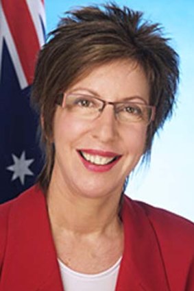 Minister urges change to Facebook breastfeeding photo ban