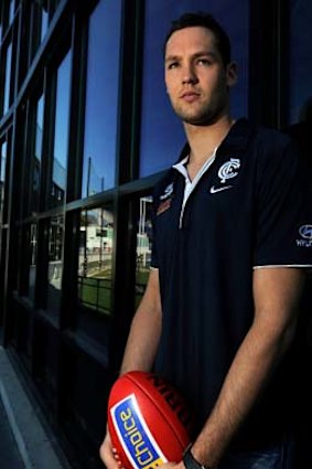 Warnock signs three-year deal