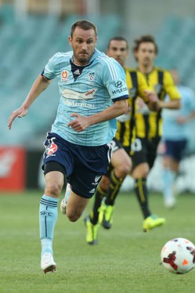 Sydney FC's Ranko Despotovic puts finishing touches to his game