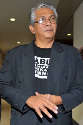 Abbott bans Malaysian activist from visiting