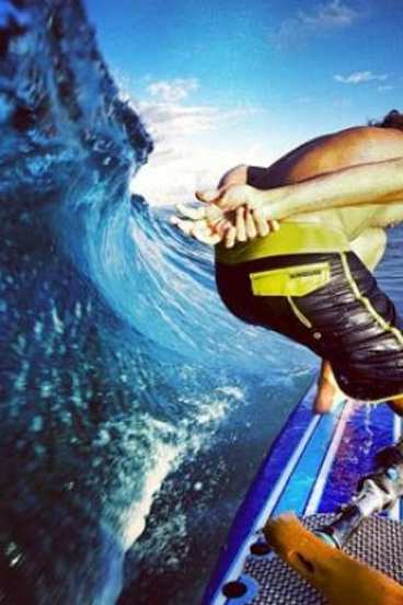 Shark attack survivor Mike Coots takes stunning surfing pictures