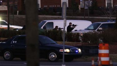 Bank hostage drama ends as police kill robber