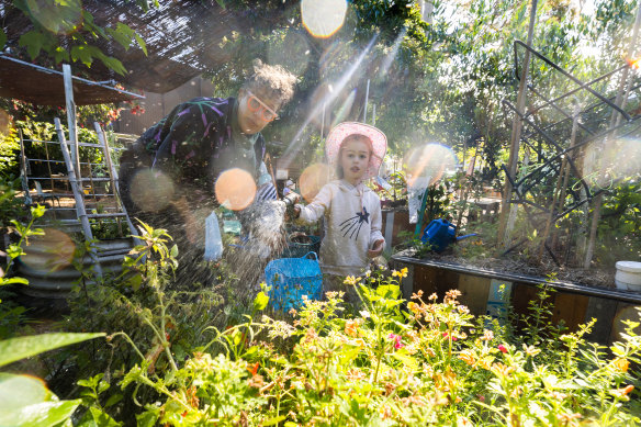 Who takes care of the school kitchen garden over the holidays?