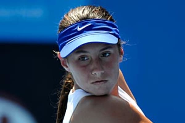 Talent's clearly in the genes as Bernard's sister takes her first shot ...