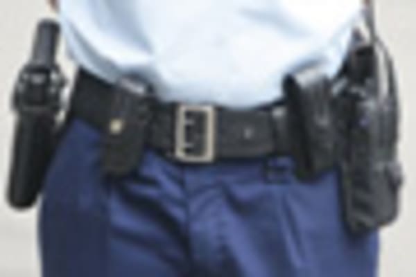 Police utility belt ruined my back: ex-cop