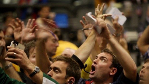 On the Chicago Futures Exchange the old 'open outcry' trading pit has ...