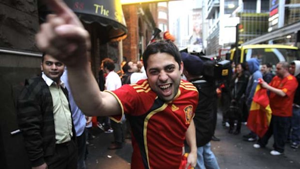 Final fever fiesta as victorious Spaniards party on