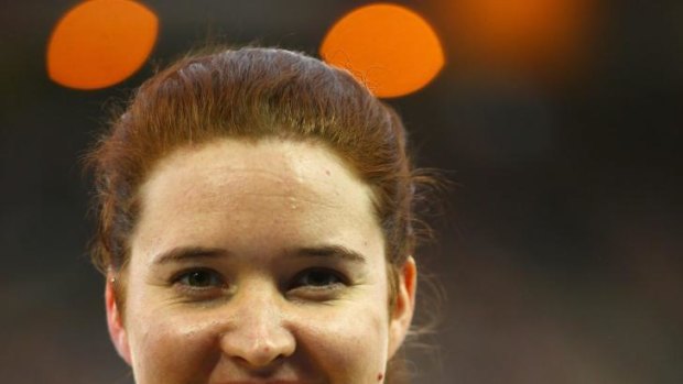 Angela Ballard pushes through rain to win Commonwealth Games gold