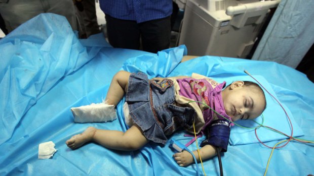Casualties of a propaganda war: Gaddafi's stunt over injured baby exposed