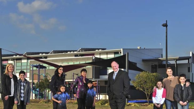 Saved by the bell: community's fighting spirit revives school