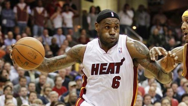 LeBron makes triumphant homecoming by ripping Cavs