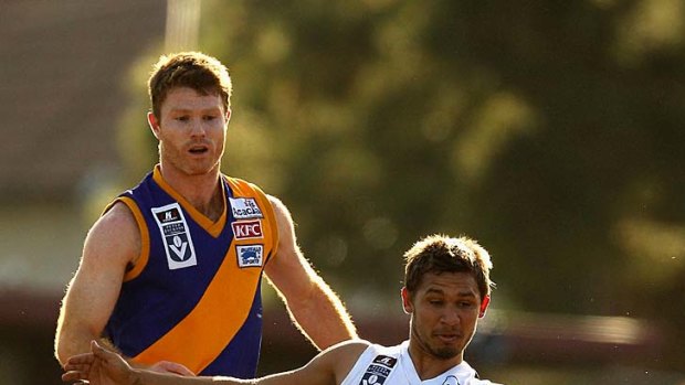 Battle-hardened Roosters fend off late Seagulls surge