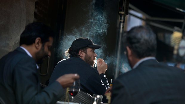 Smoking to remain in outdoor drinking areas but not where food is served