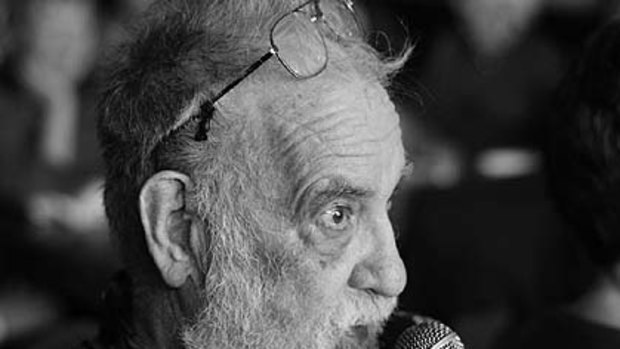 Activist scribe struck from the left