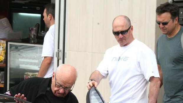 The chairman, his minder and his personal trainer