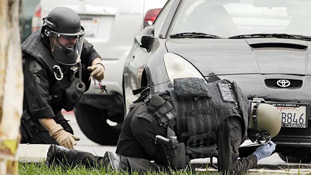 Like a movie: bank manager has 'bomb' strapped to chest in heist