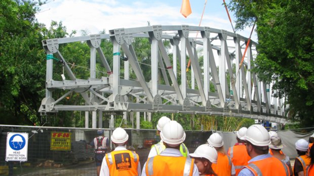 Cycle bridge swings into place