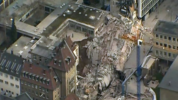 Building collapses into pile of rubble