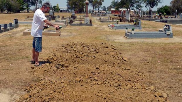 In a dusty country cemetery, Ned Kelly finally granted his dying wish
