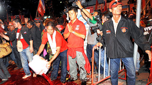 Thai protests turn bloody - but not violent