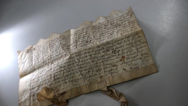 Rare Tudor parchment from 1583 found in Alice in Wonderland book in ...