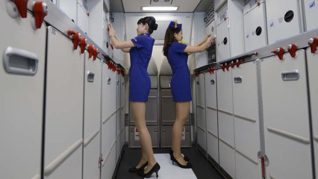 Budget airline under fire over flight attendants' short skirts