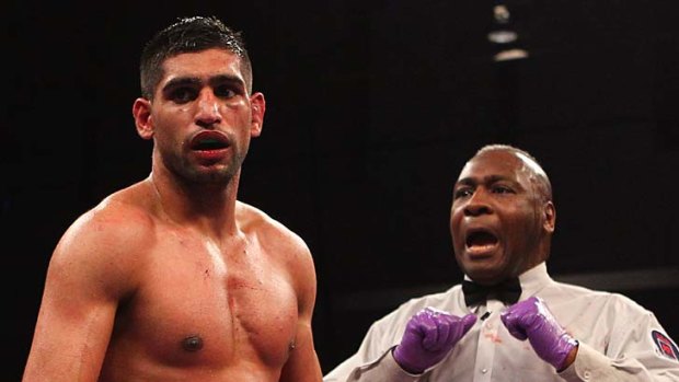 British boxer raises questions over mystery man following controversial ...