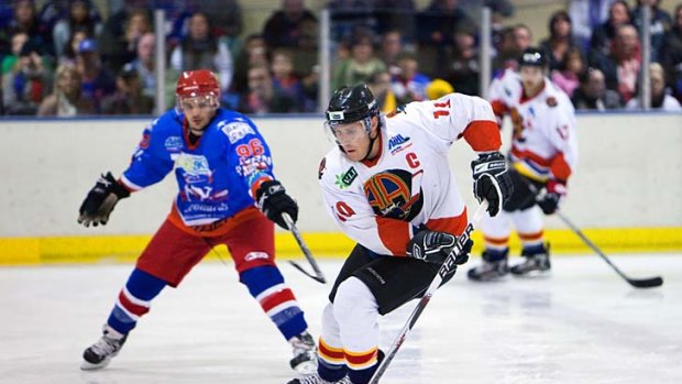 Ice hockey shoots, and scores