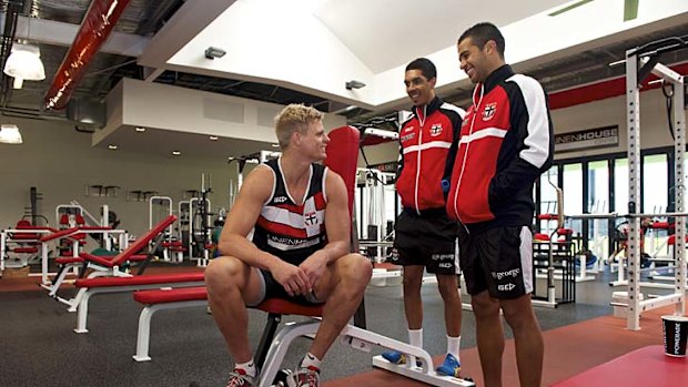 Saints circle the men in the middle