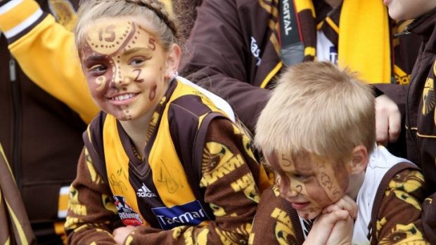 Pilgrims flock to brown and gold temple in a regular Hawthorn ritual