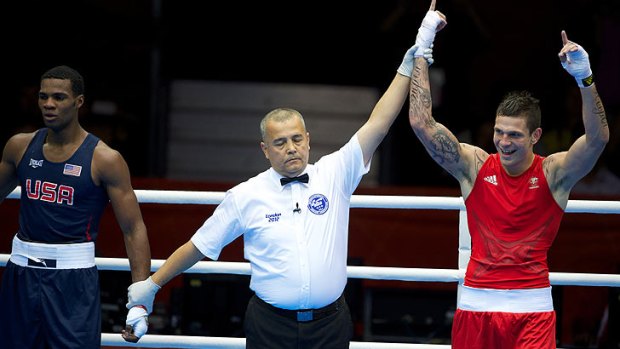 Olympic boxer charged with assaulting police