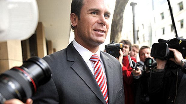 Wayne Carey to fight assault charges