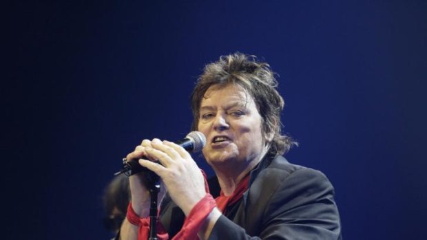 Doc Neeson's last recording finds him walking in the rain