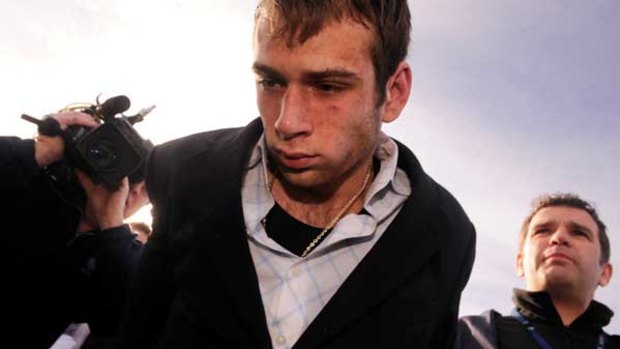 Accused teen gunman faces court