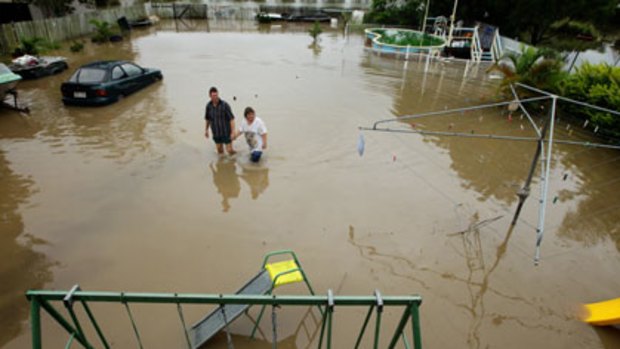 Eight metres high and rising: Rockhampton braces for trouble