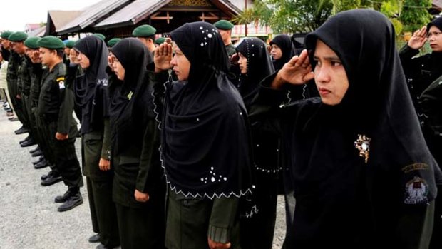 Aceh's religious police crack down on tight jeans