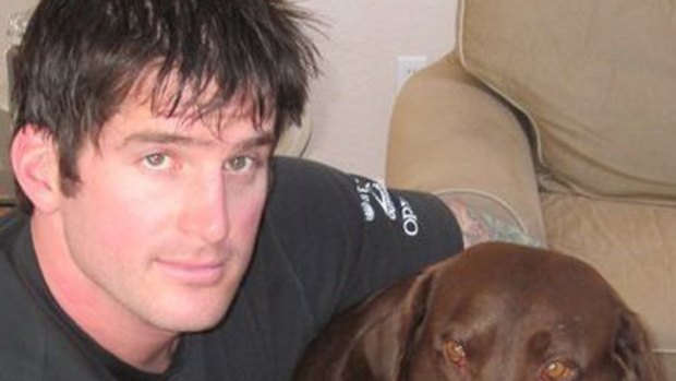 Faithful to the last: slain Navy SEAL's dog stays by his side at funeral