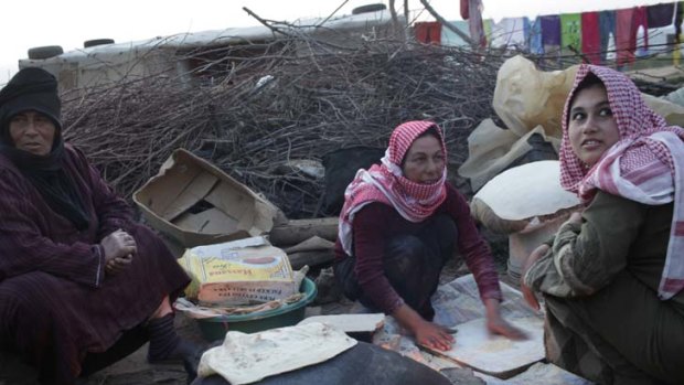 Syrian crackdown takes sectarian turn as Sunnis flee to Lebanon