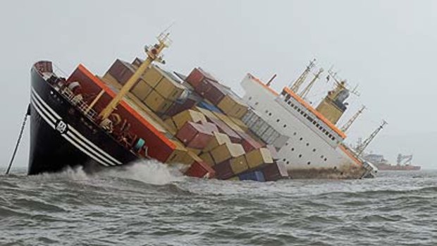 Container ship loses load and oil