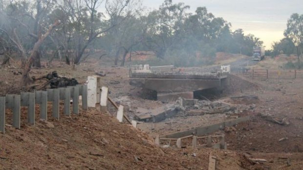Ammonium nitrate still at truck crash scene: explosives examiners